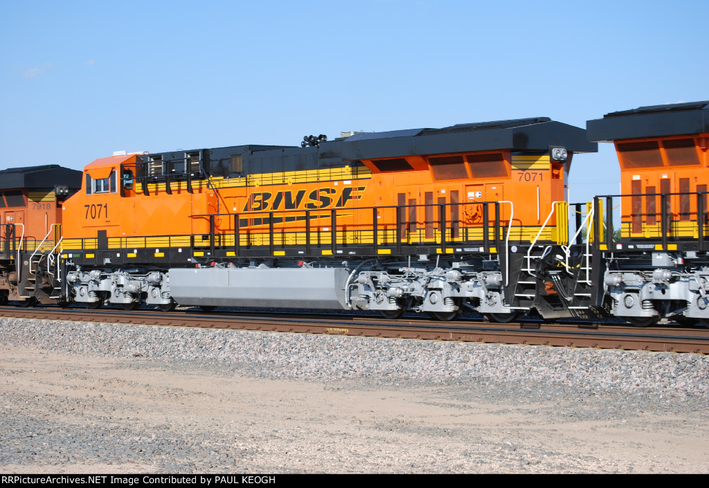 BNSF 7071 quartering Tail shot passes me with the rear end of BNSF 7070 in the shot :)).